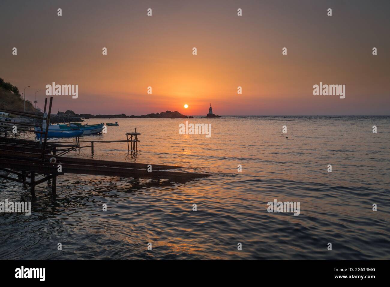 Ahtopol - September 10: Sunrise at the beach with fishing pier, rocks ...