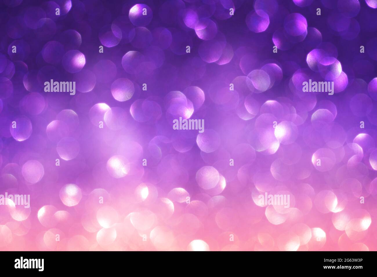 Abstract background of purple glowing bokeh Stock Photo - Alamy
