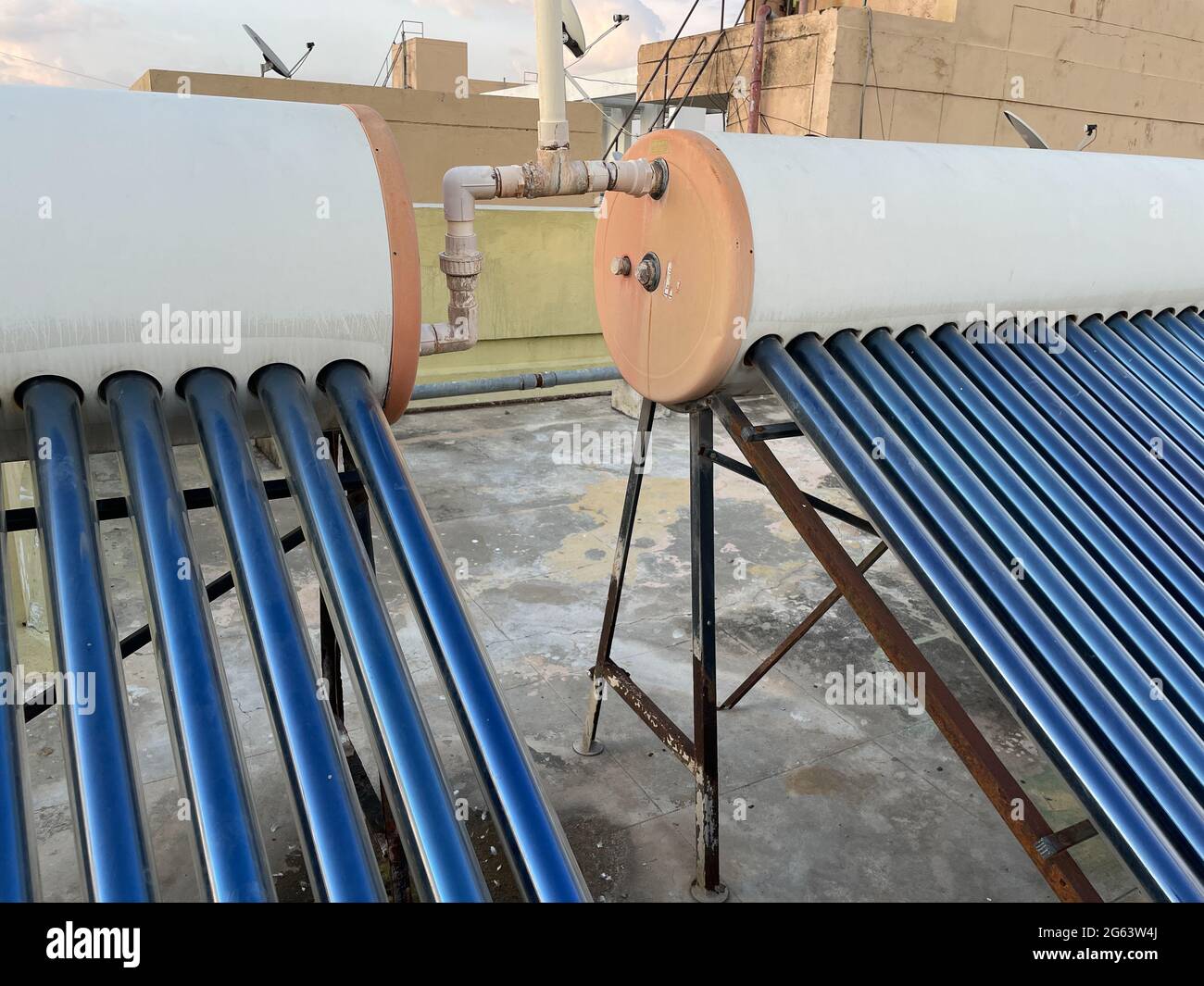 Solar panel tubes installed on roof tops to conserve energy and as ...