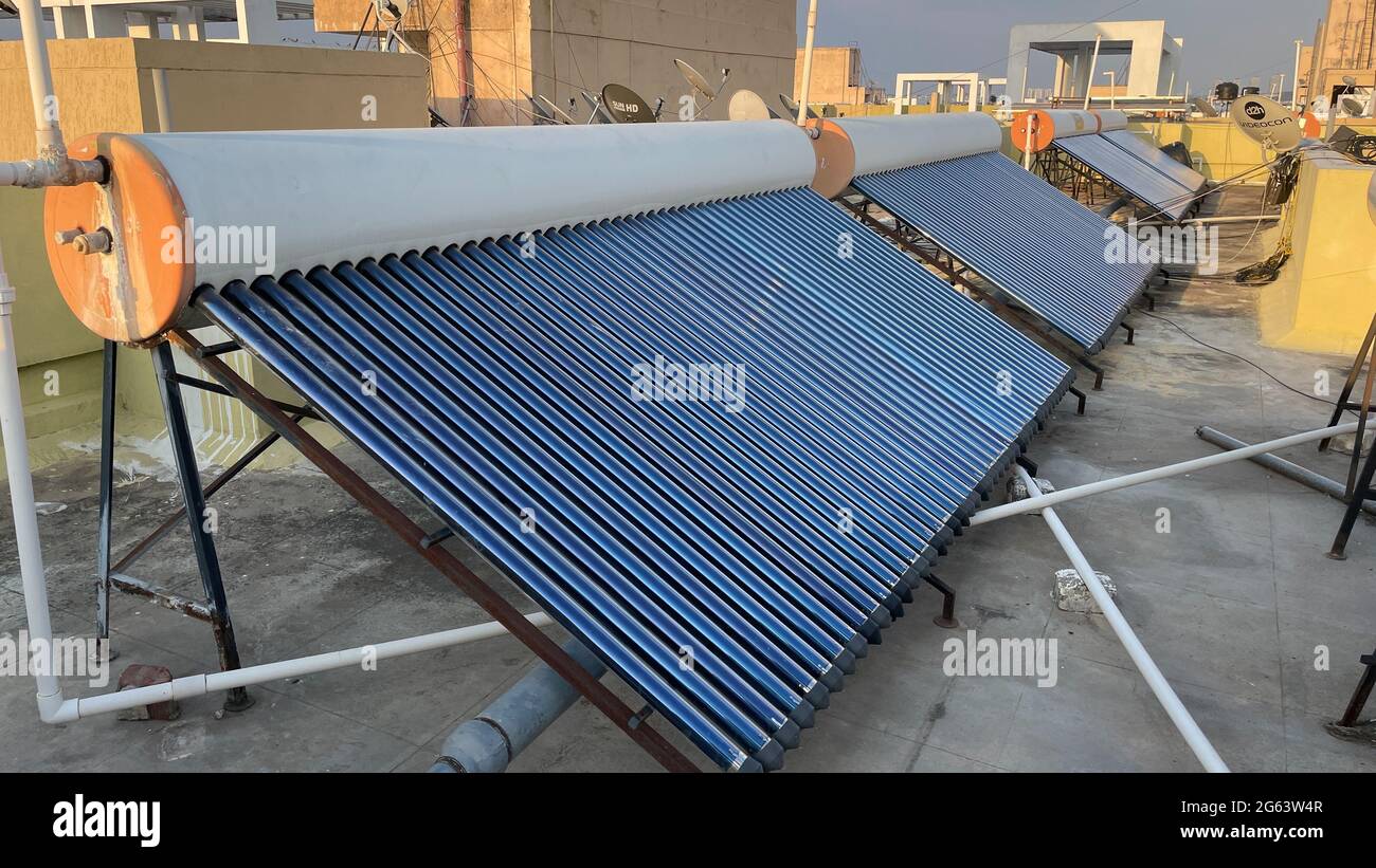 Solar panel tubes installed on roof tops to conserve energy and as ...