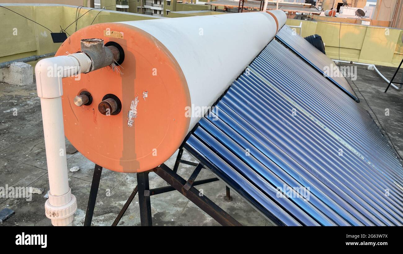 Solar panel tubes installed on roof tops to conserve energy and as ...