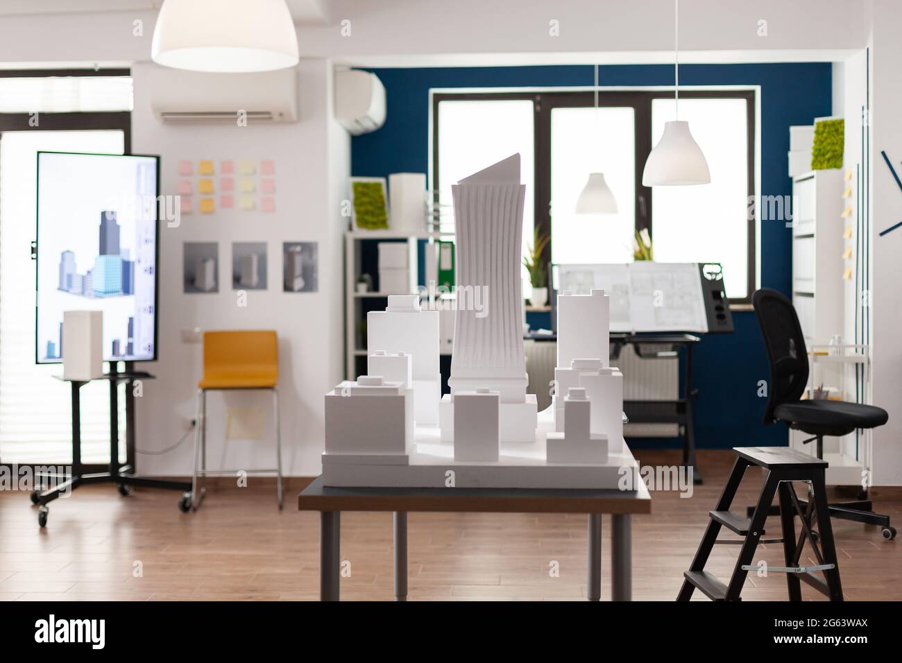 Empty architectural office and workplace with desk table design board ...