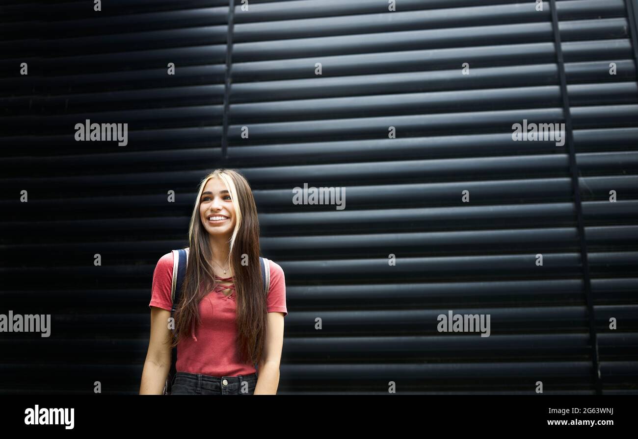 Portrait of a young European student smiling Stock Photo - Alamy