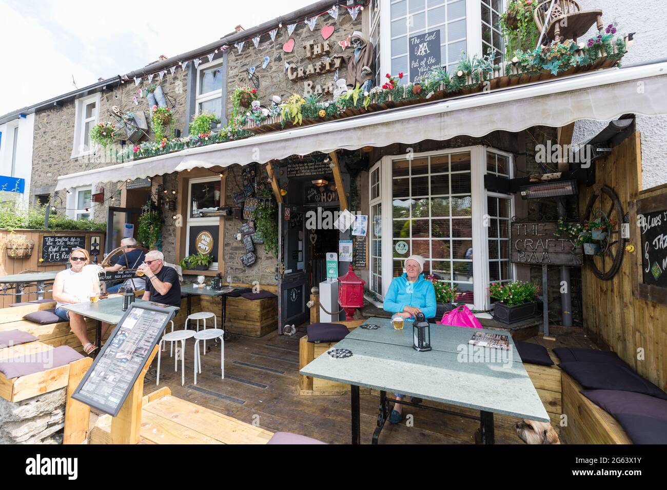 Cumbria, UK. 2nd July, 2021. UK The Crafty Baa pub in Windermere has ...