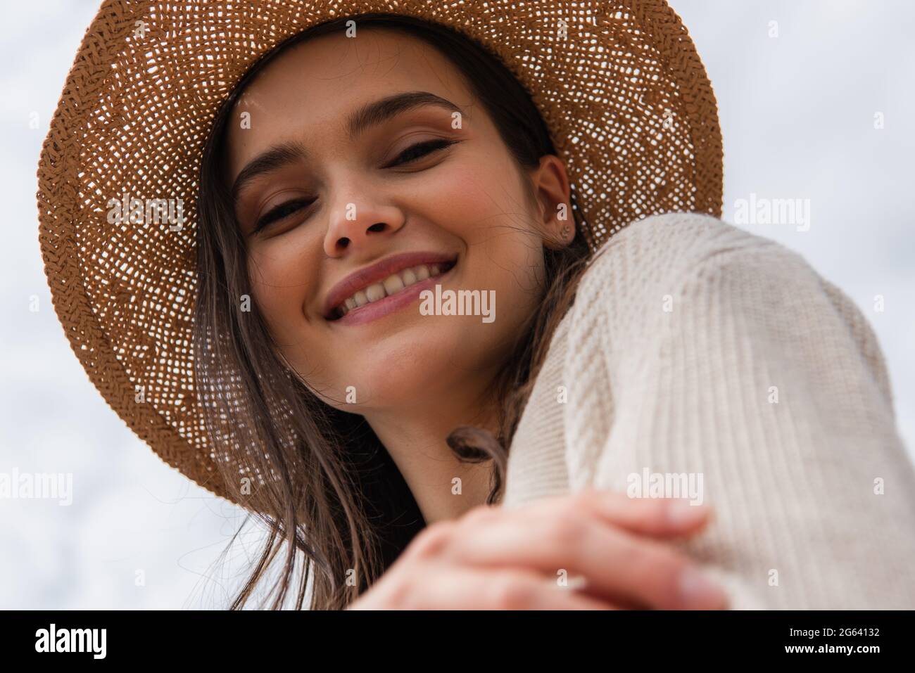 Woman in sun hat low angle hi-res stock photography and images - Alamy