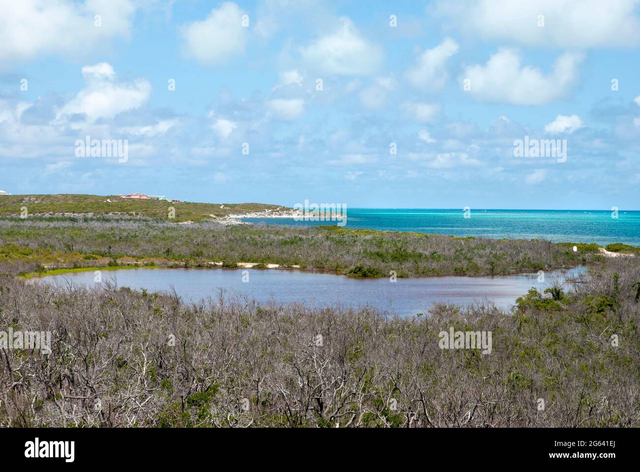 The aerial view of Grand Turk flat landscape with a lagoon and ...