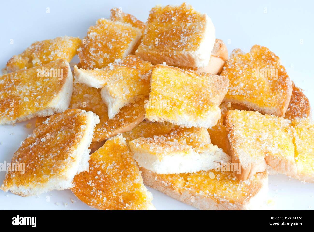 Toasted bread with butter and sugar Stock Photo - Alamy