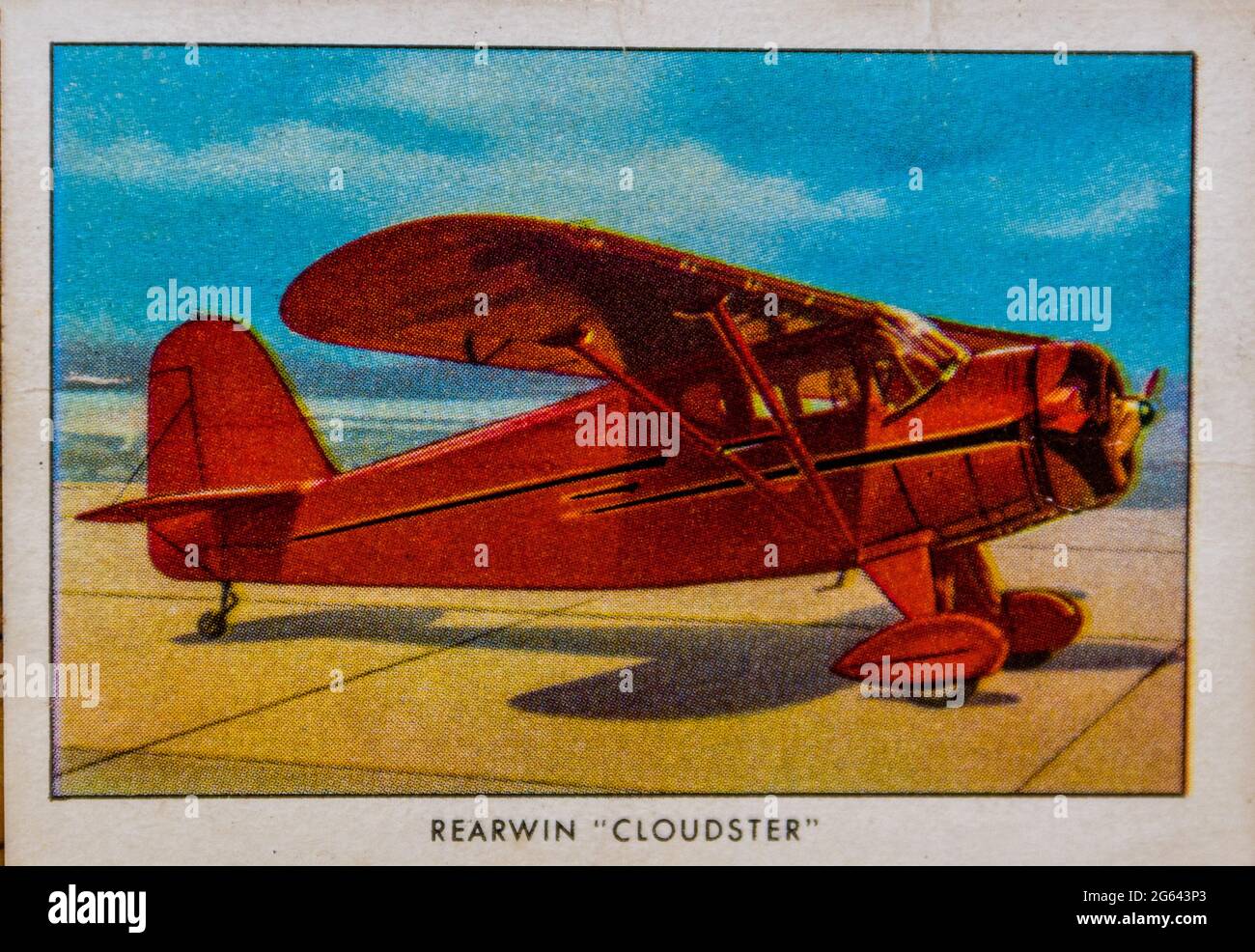 A Rearwin Cloudster aircraft on a battered Wings Cigarette card from a ...