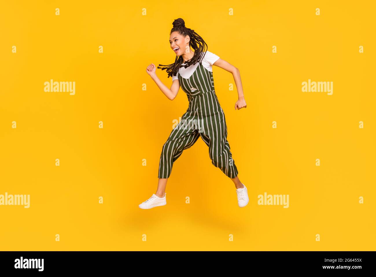 Full length body size of lovely cheerful motivated girl jumping running ...
