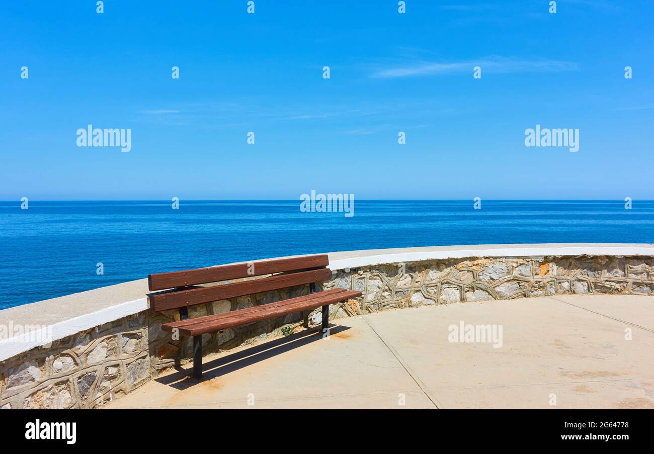 Bench on promenade along the sea in Rethimno, Crete Island, Greece ...