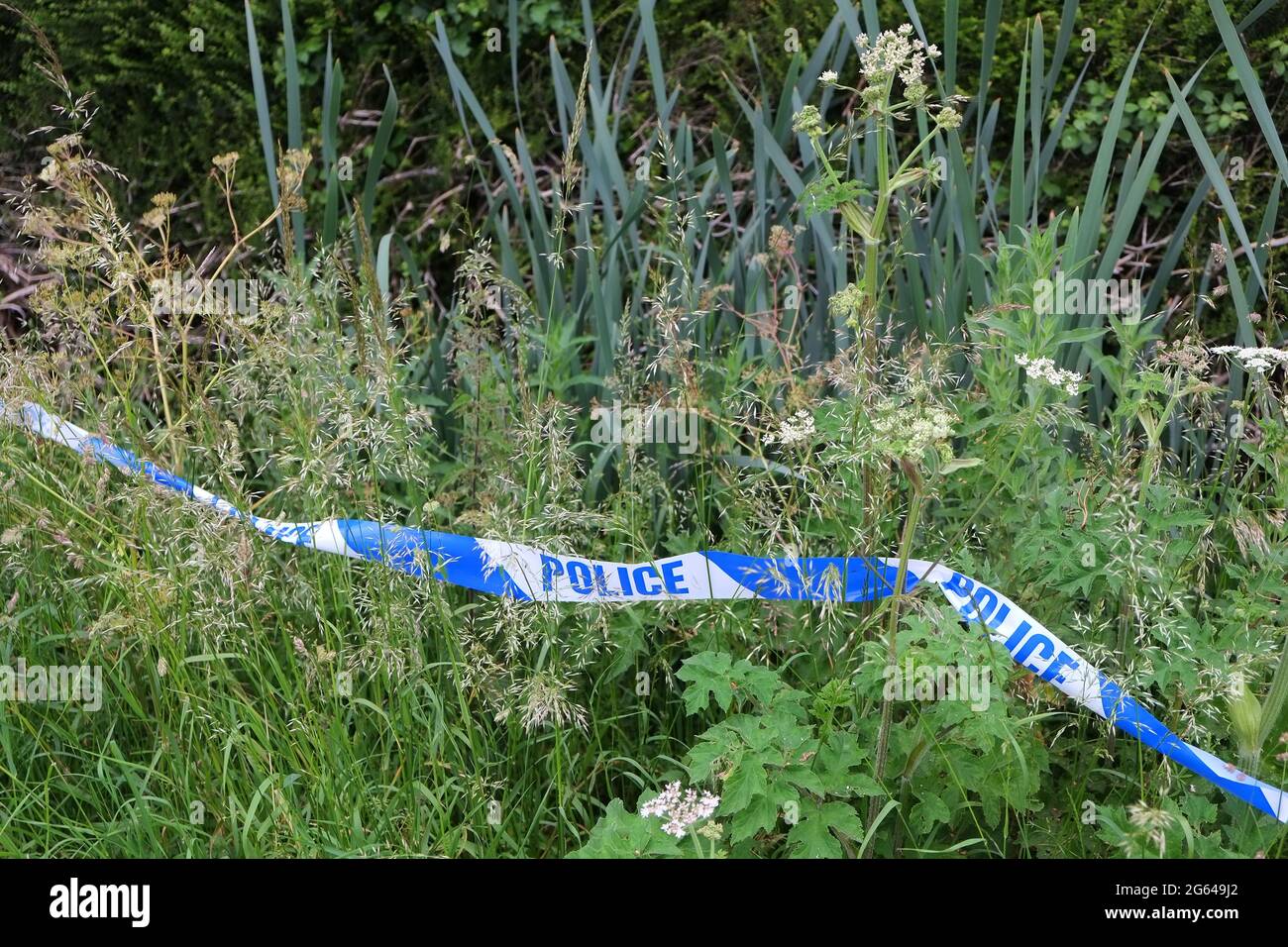 June 2021 - Police tape at a car crash accident site on rural lane in ...