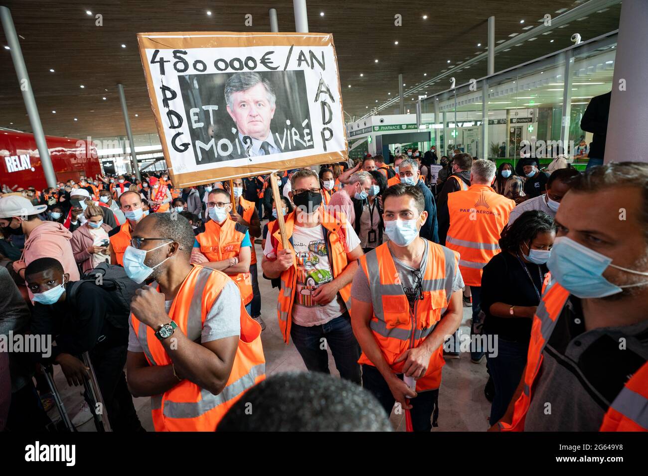 Charles De Gaulle Paris airport workers block terminal to protest for ...