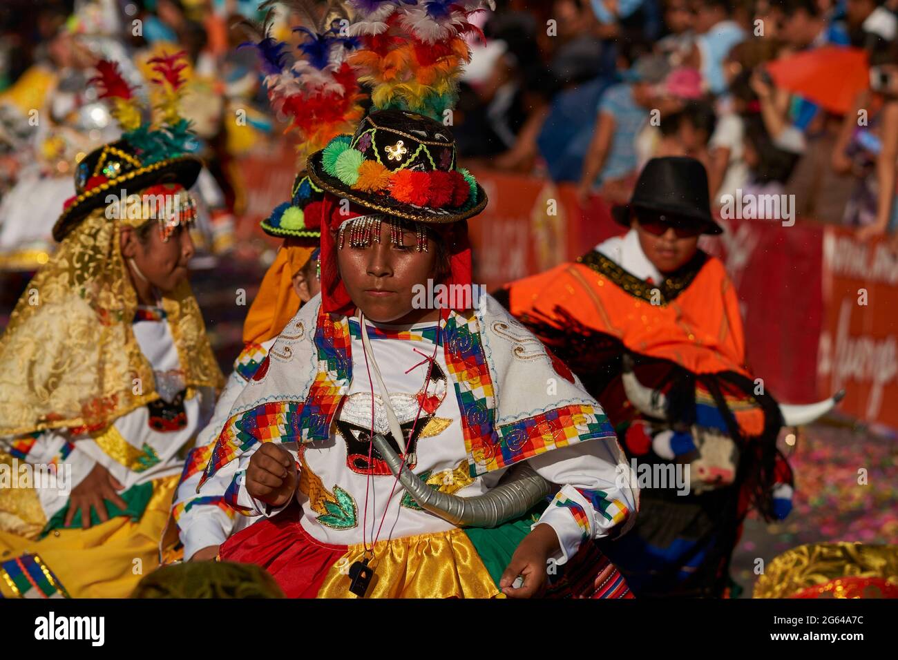 Members of a Waca Waca dance group in ornate costume performing at the ...