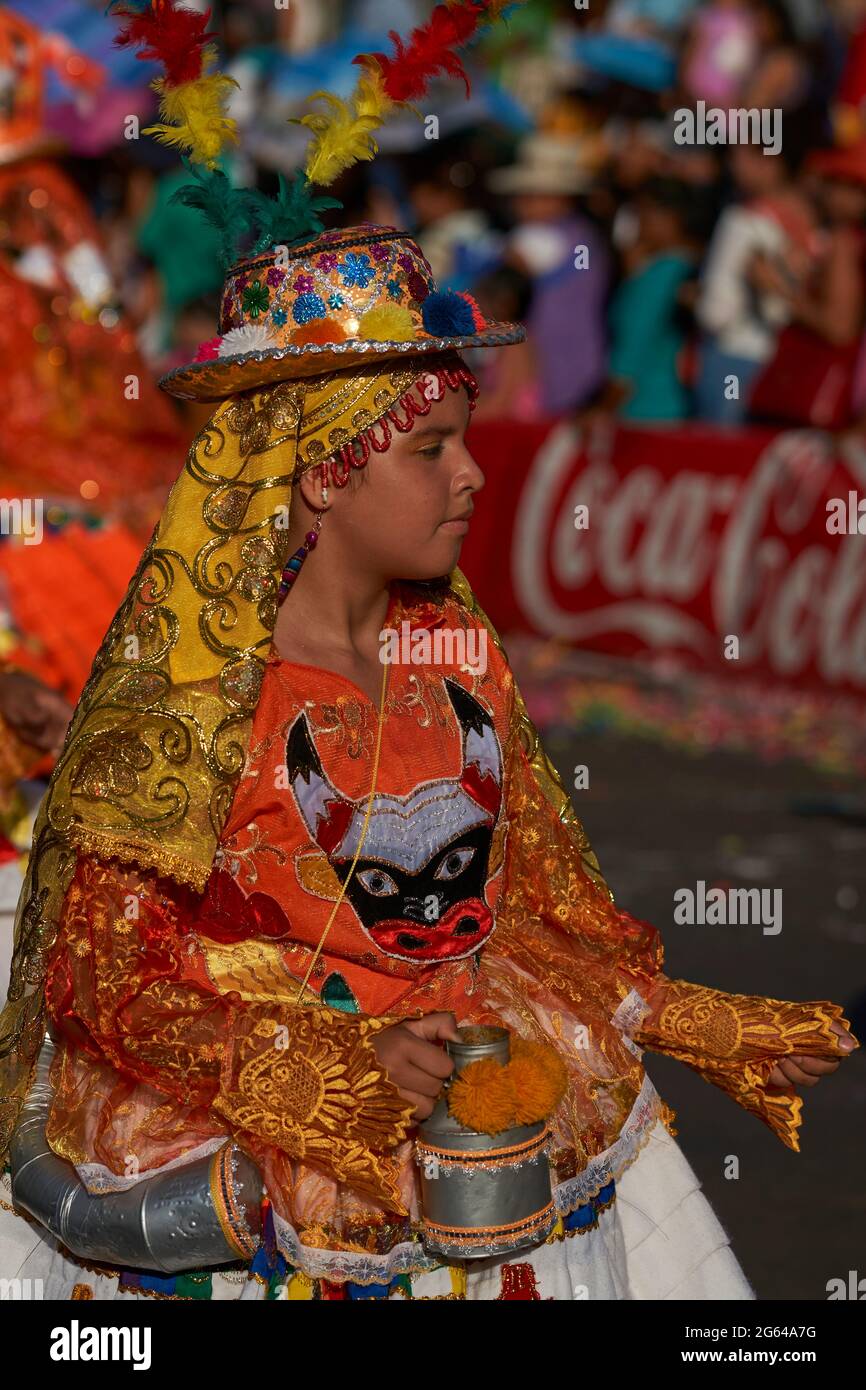 Members of a Waca Waca dance group in ornate costume performing at the ...