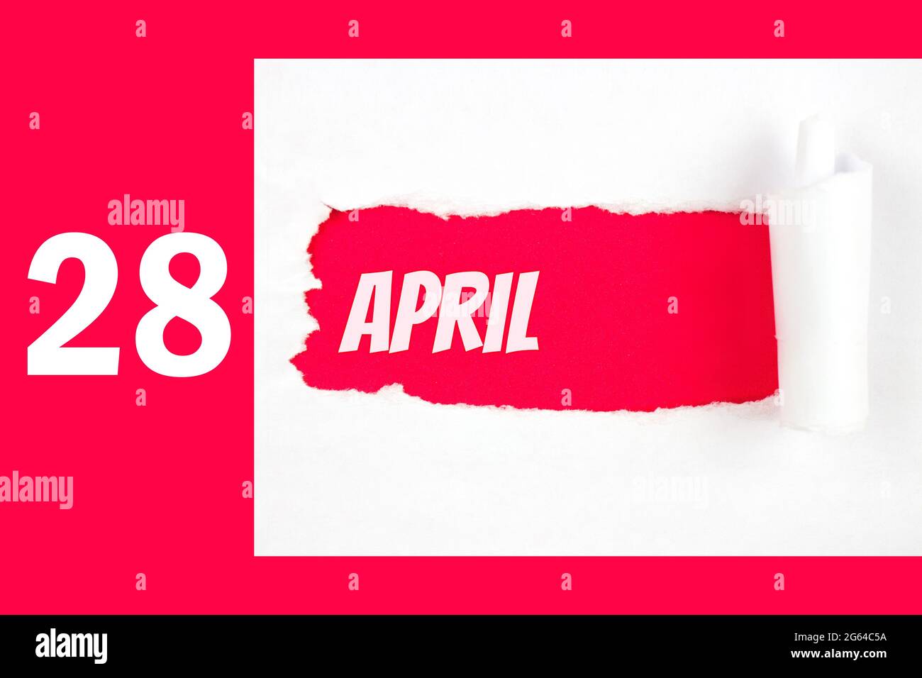 April 28th. Day 28 of month, Calendar date. Red Hole in the white paper ...