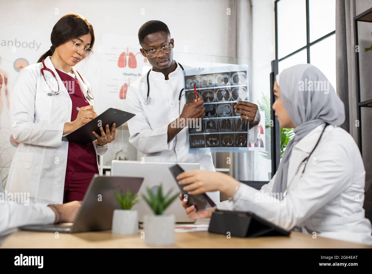 Team qualified multiracial doctors hi-res stock photography and images ...