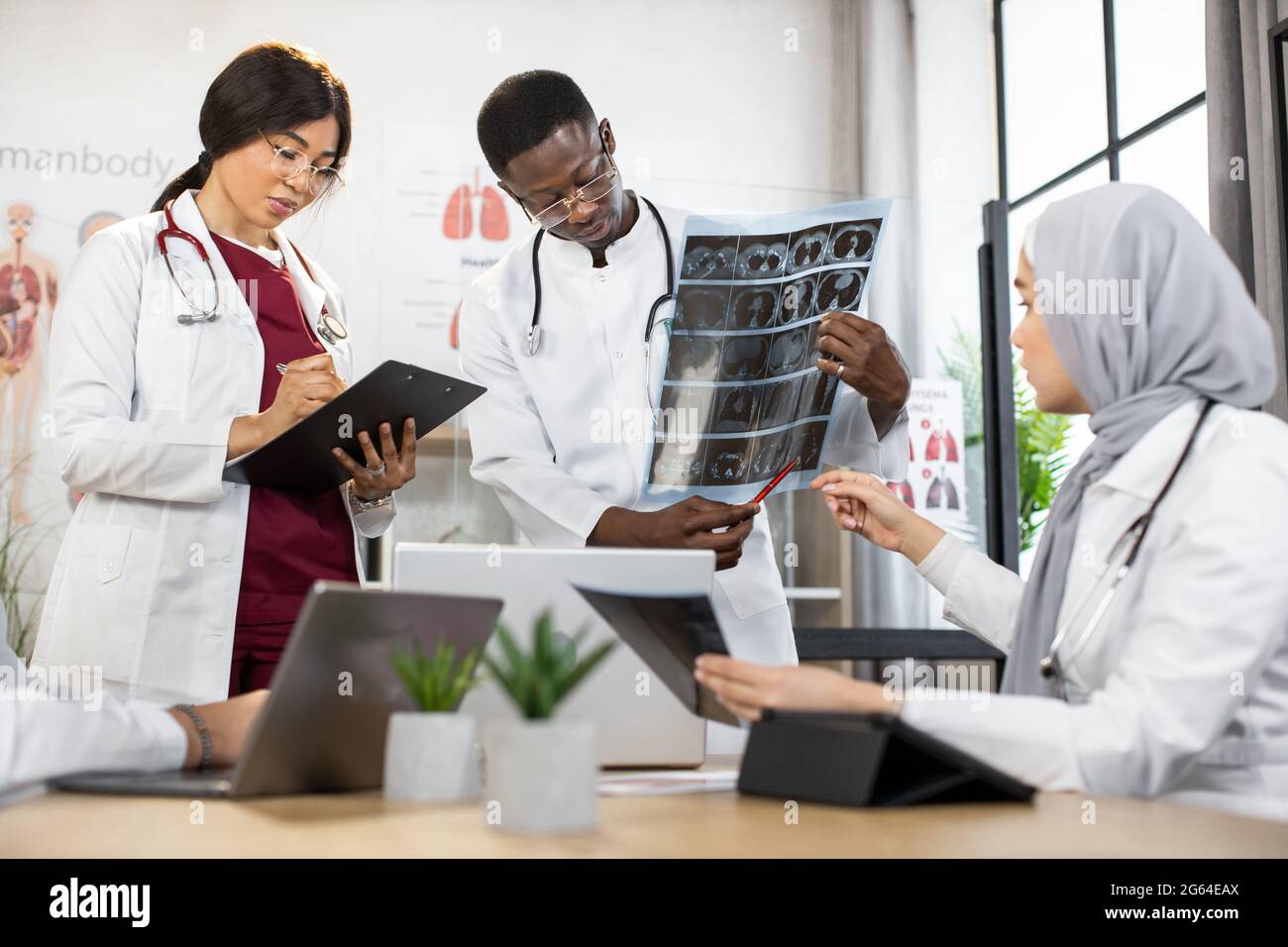 Team qualified multiracial doctors hi-res stock photography and images ...