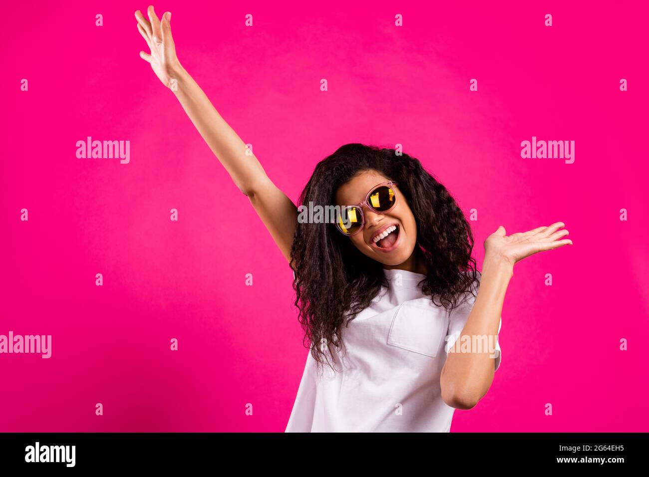 Photo of cool wavy young millennial lady dance wear spectacles white t ...