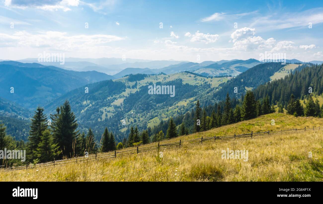 Amazing mountain landscape with blue sky with white clouds, sunny ...