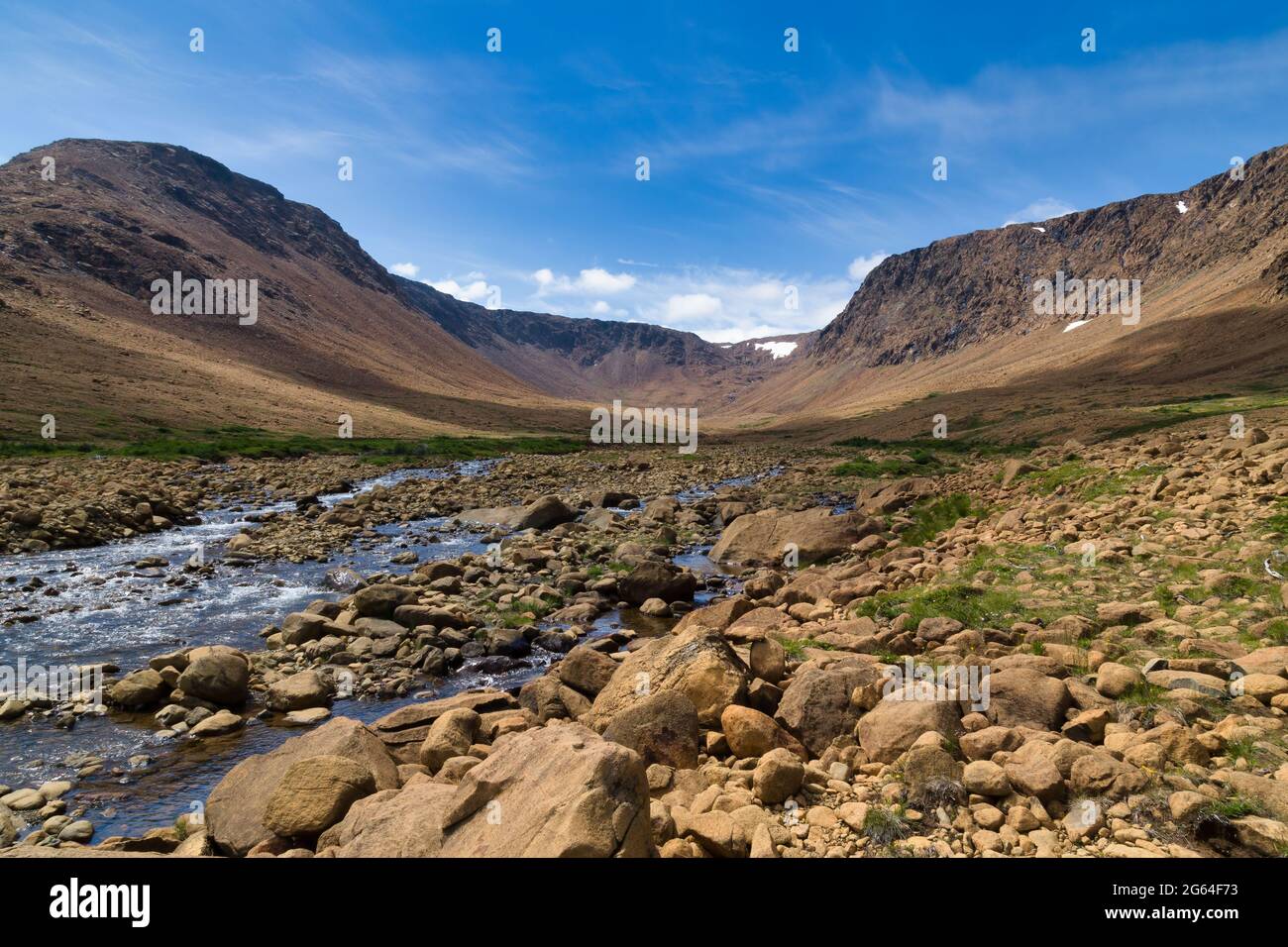 Rocky creek flowing down from mountains - Tablelands, Gros Morne ...