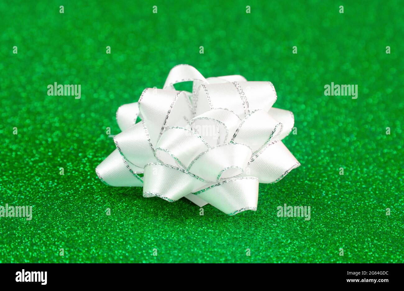 Simple White Bow on a Blue Background Stock Photo - Alamy