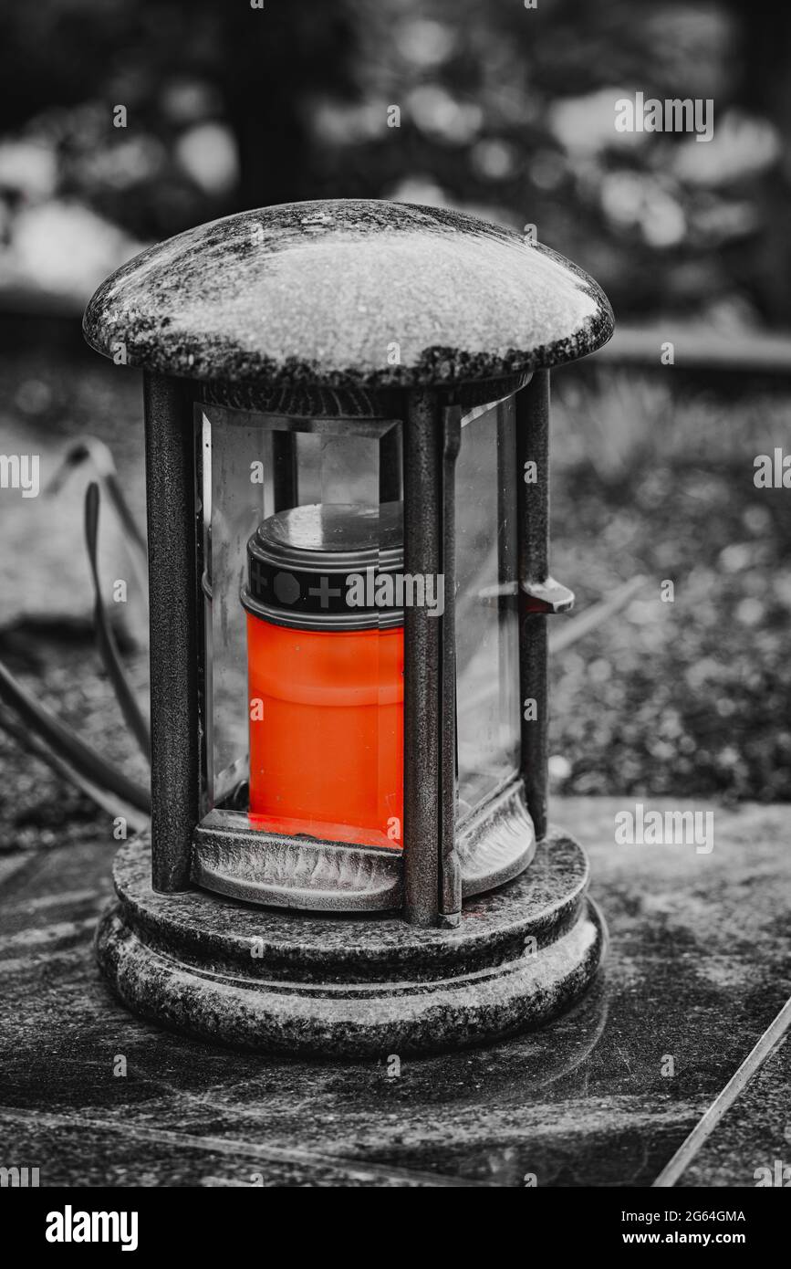 Old damaged grave lantern on a gravestone Stock Photo - Alamy