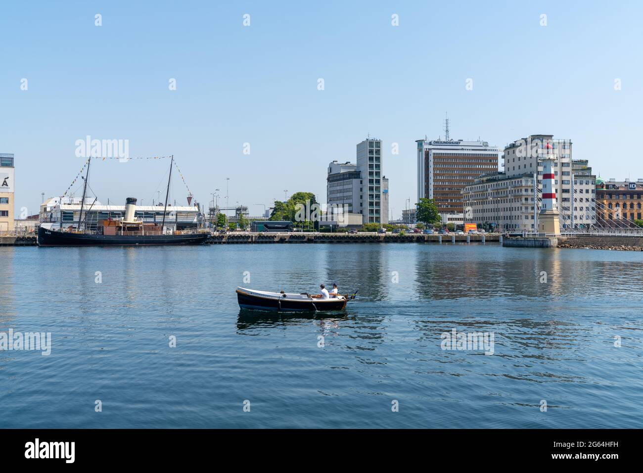 Malmo, Sweden - 18 June, 2021: small boat cruising through the harbor ...