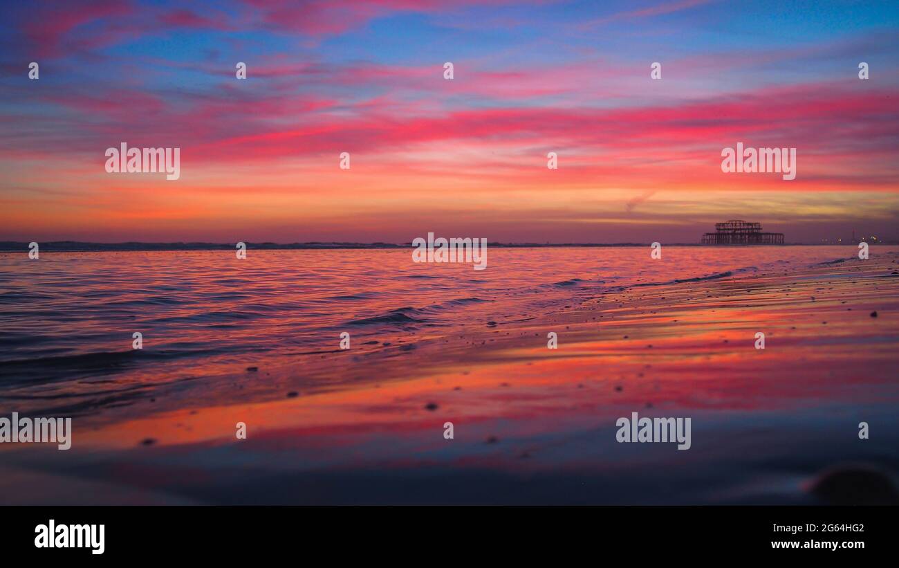 Beautiful sunset on the pacific beach Stock Photo - Alamy