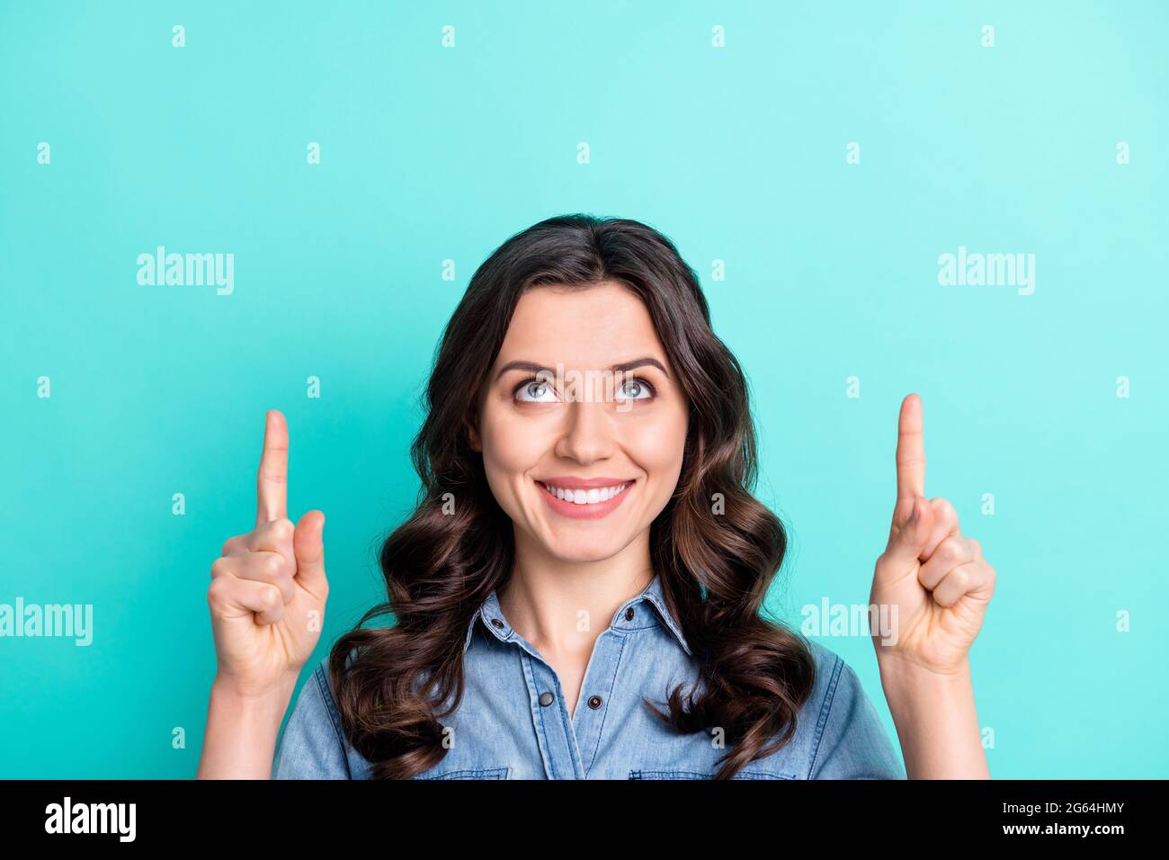 Photo of young girl happy positive smile look point fingers empty space ...