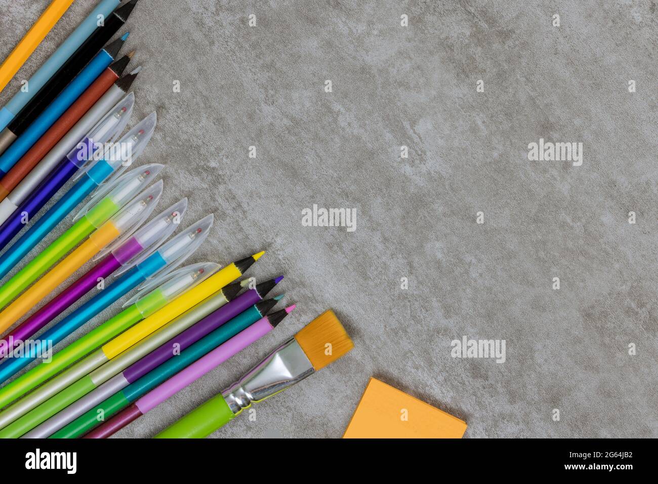 Various school art supplies on layout of student material group of flat ...