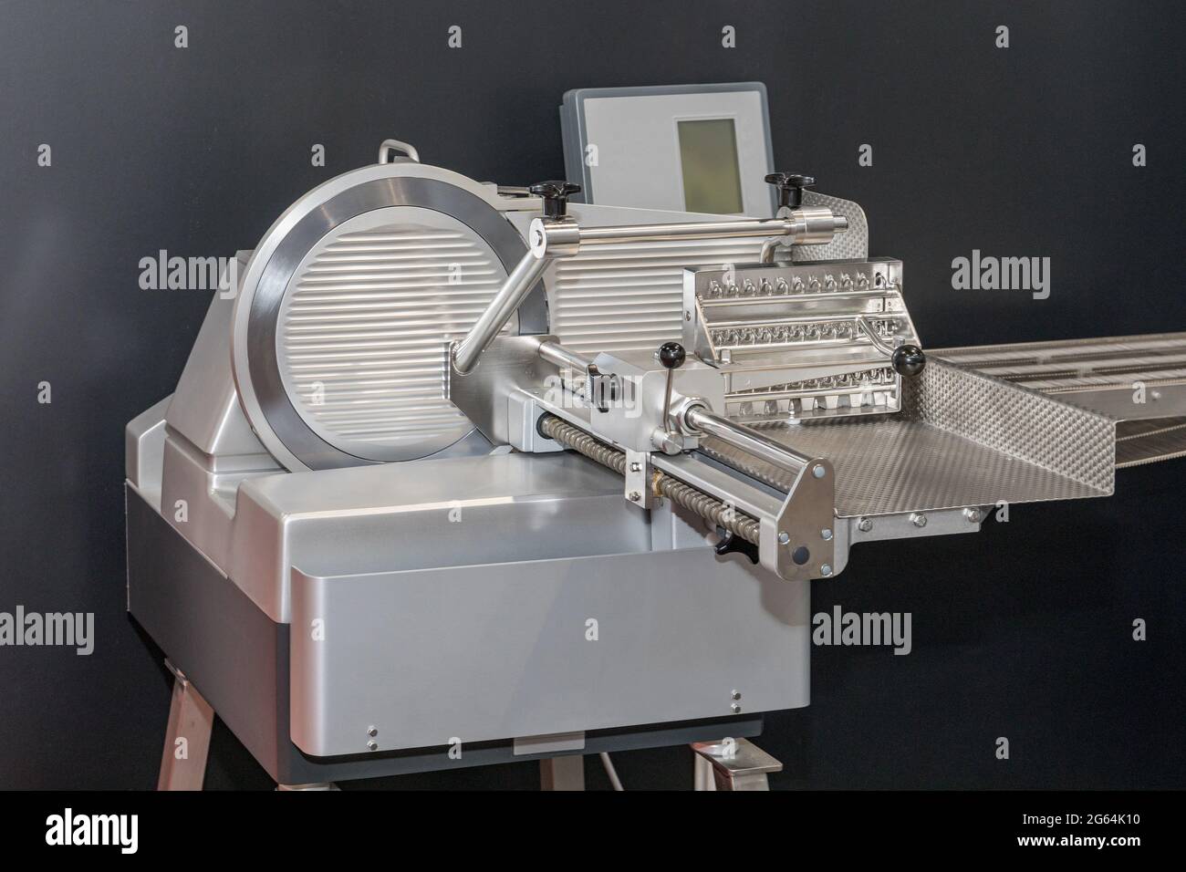 Big Automatic Meat Slicer in Food Production Factory Stock Photo - Alamy