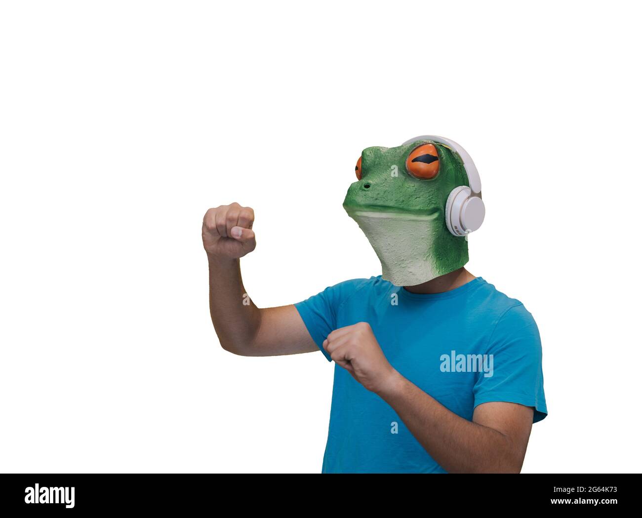 man with an animal mask of a frog on his head listening to music with ...