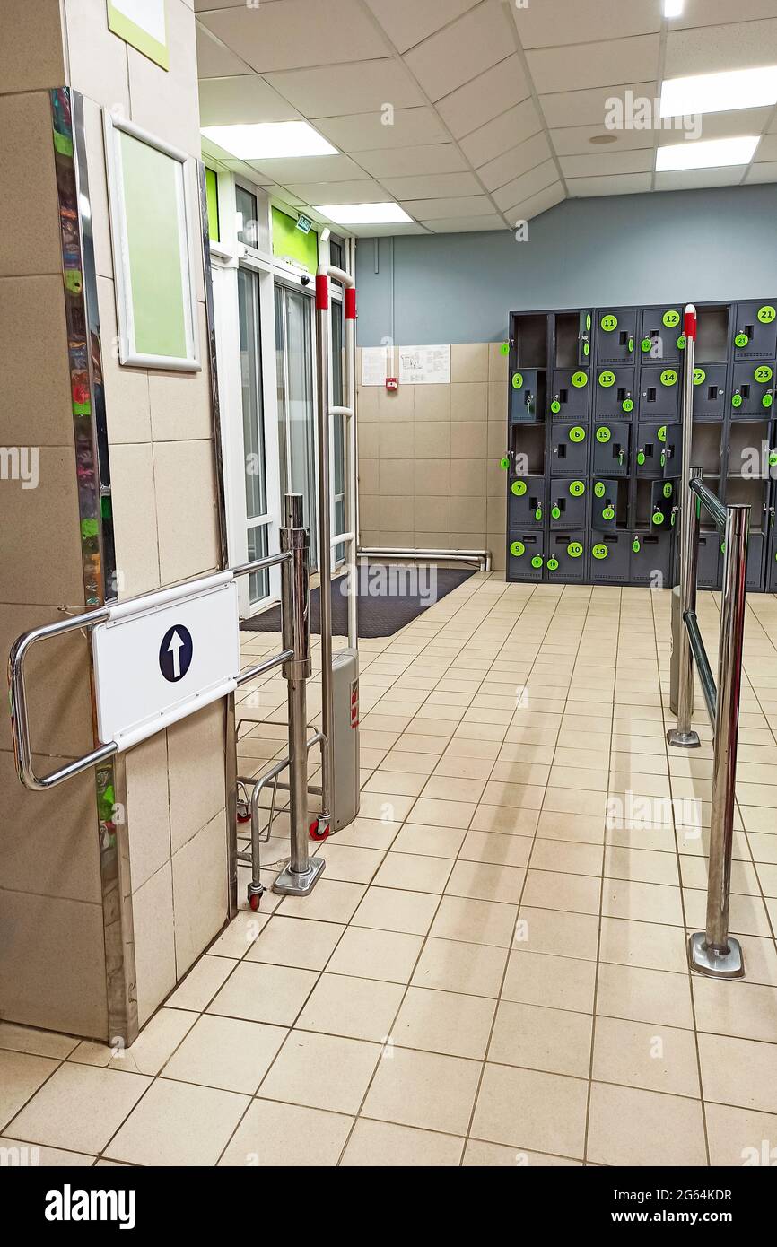 Shop entrance gate supermarket security hi-res stock photography and ...