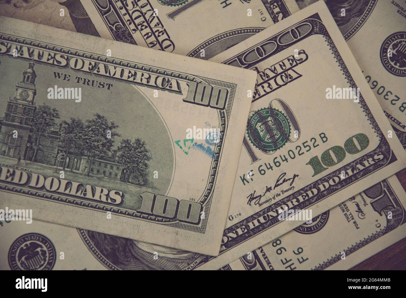 Flat lay American cash banknotes 100 dollar bills marked by inked ...