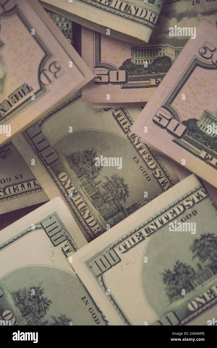 Financial background of mess US dollar paper cash banknotes. Vertical ...