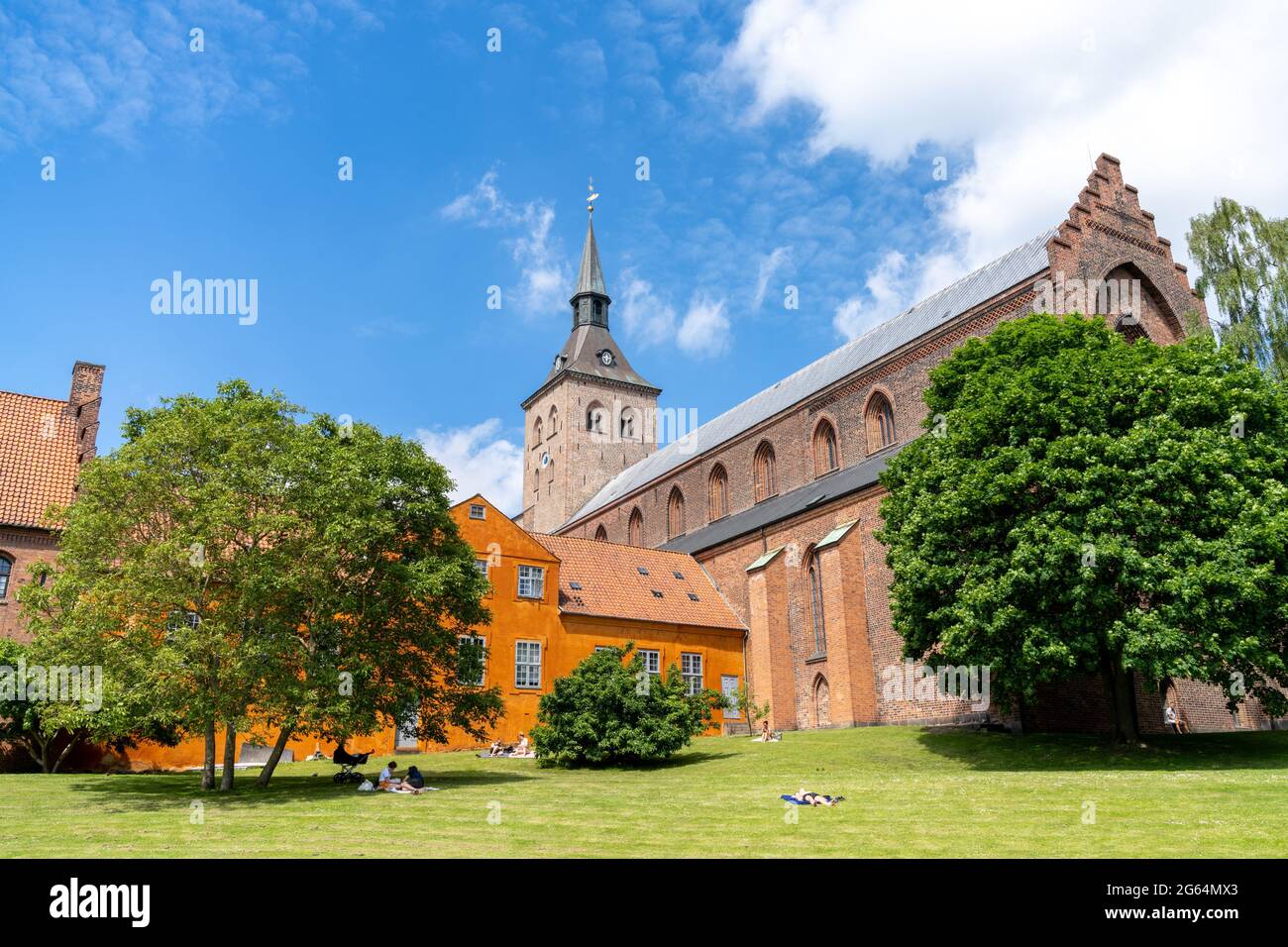 Odense,Denmark - 9 June, 2021: the city park and cathedral of Saint ...