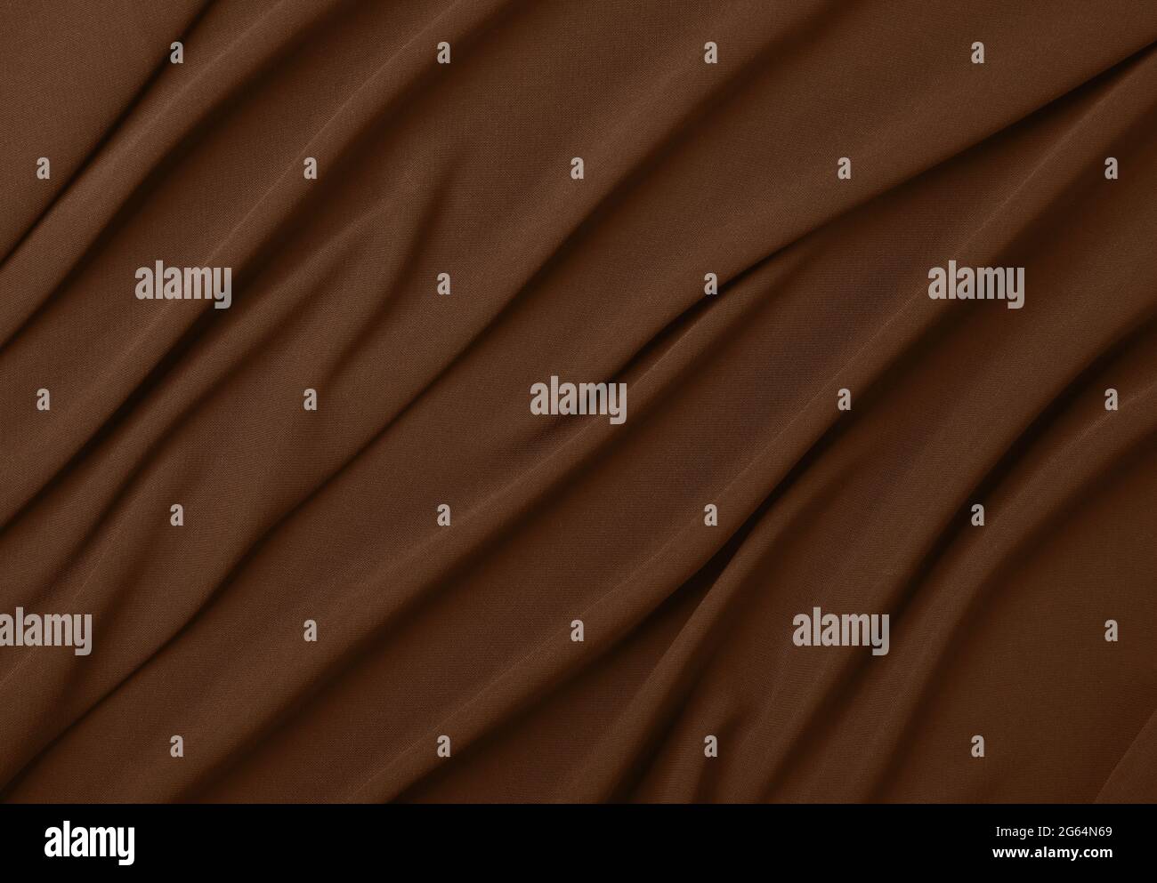 Close up abstract textile background of dark brown folded pleats of ...