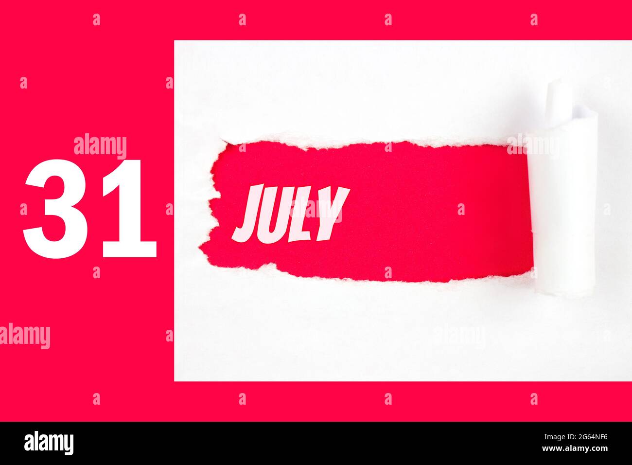 July 31st . Day 31 of month, Calendar date. Red Hole in the white paper ...
