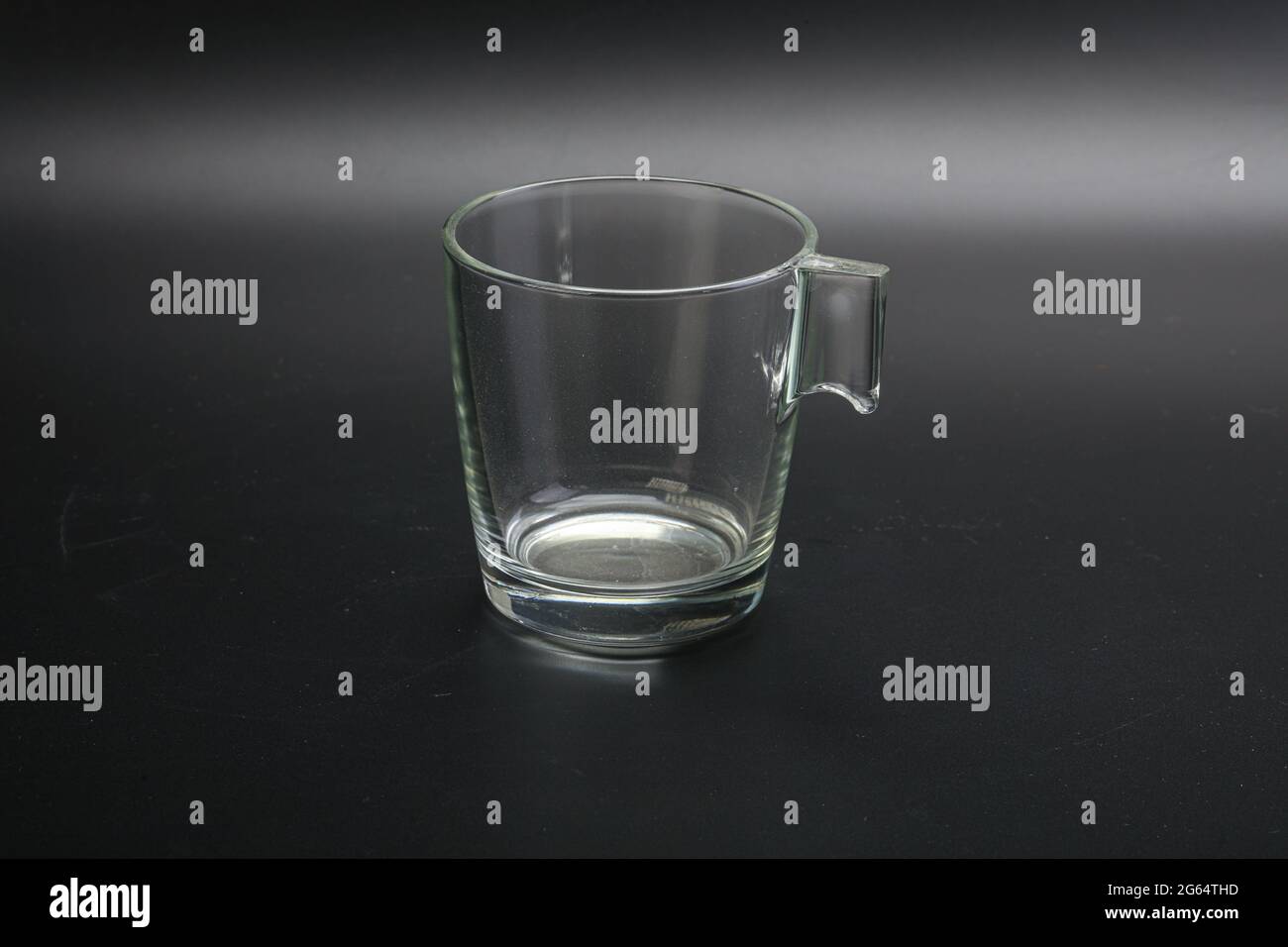 Empty glass cup for drinks isolated Stock Photo - Alamy