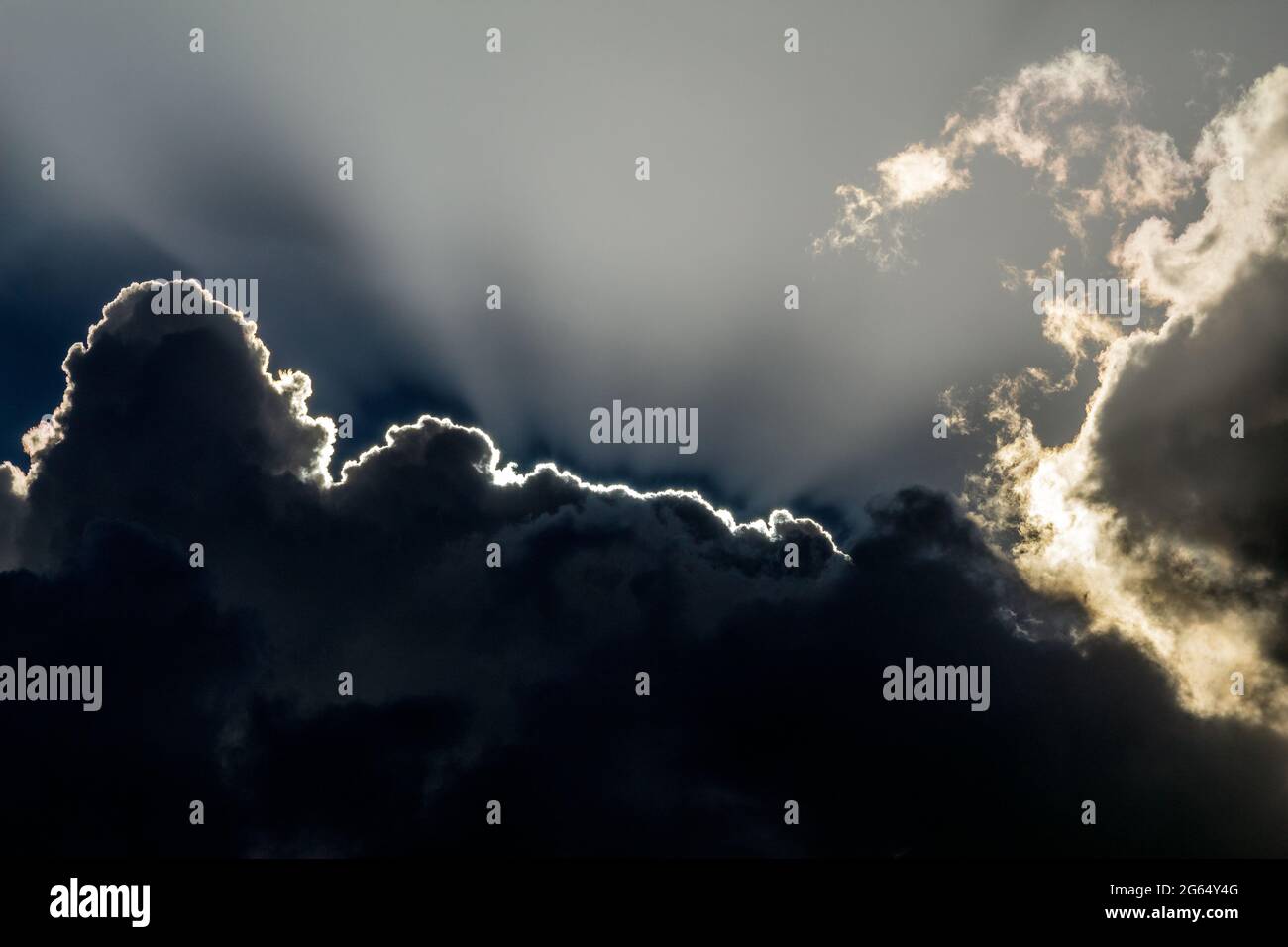 Sun rays in the clouds hi-res stock photography and images - Alamy