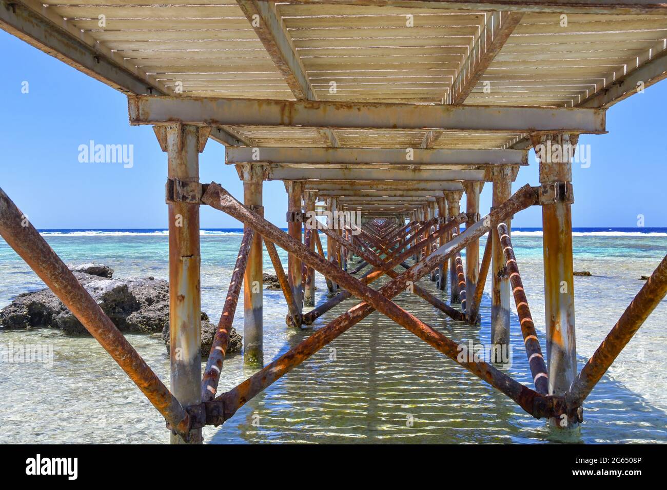 Rusty metal steel structure under the pier Stock Photo - Alamy
