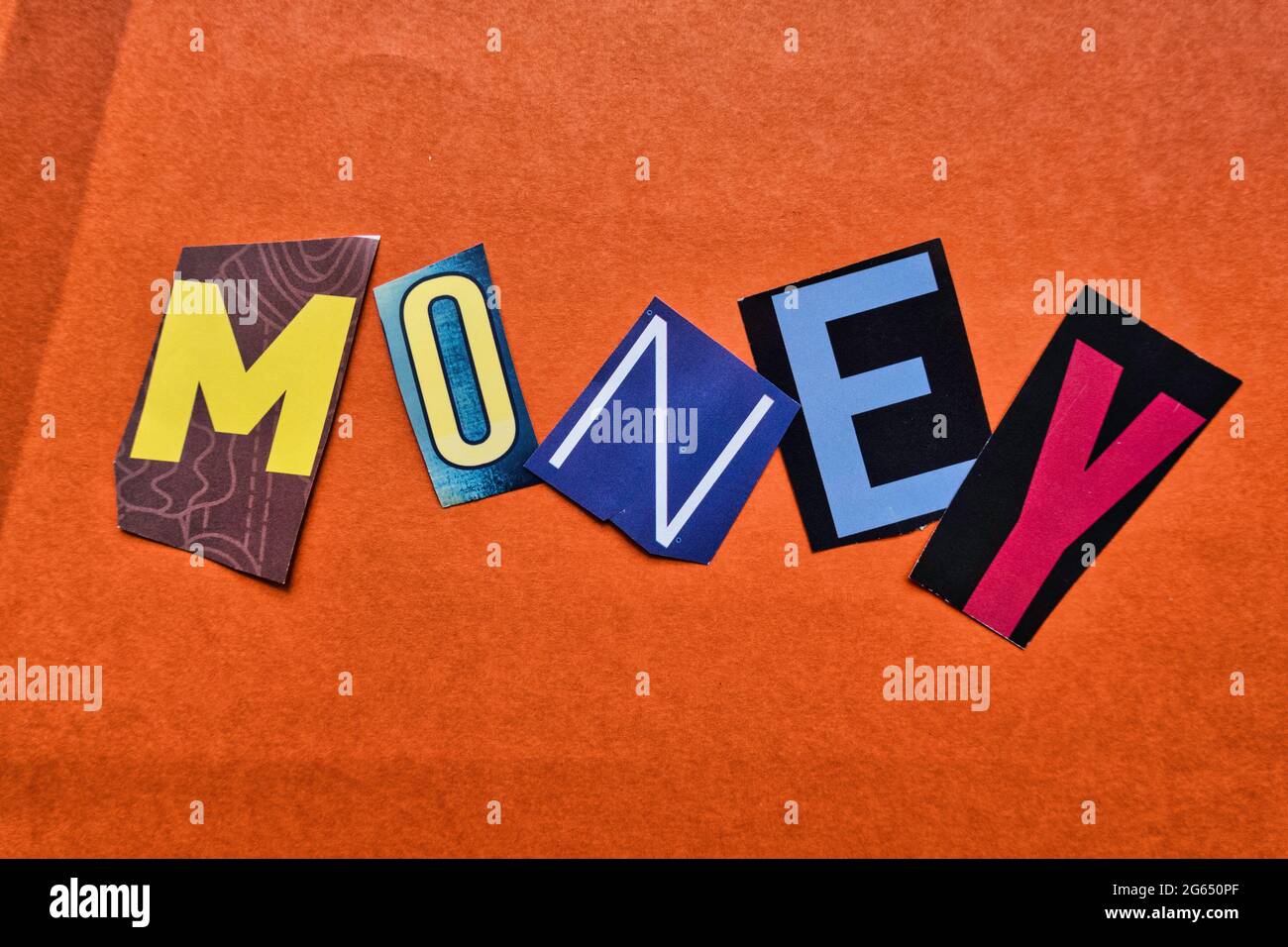 The Word "Money" is spelled out in ransom note style typography, USA ...