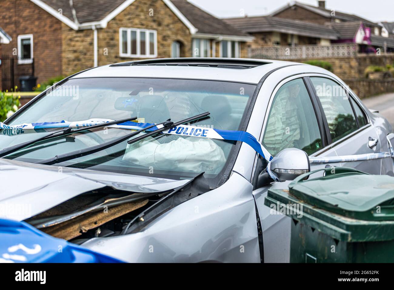 Smashed Car with Police Tape Stock Photo - Alamy