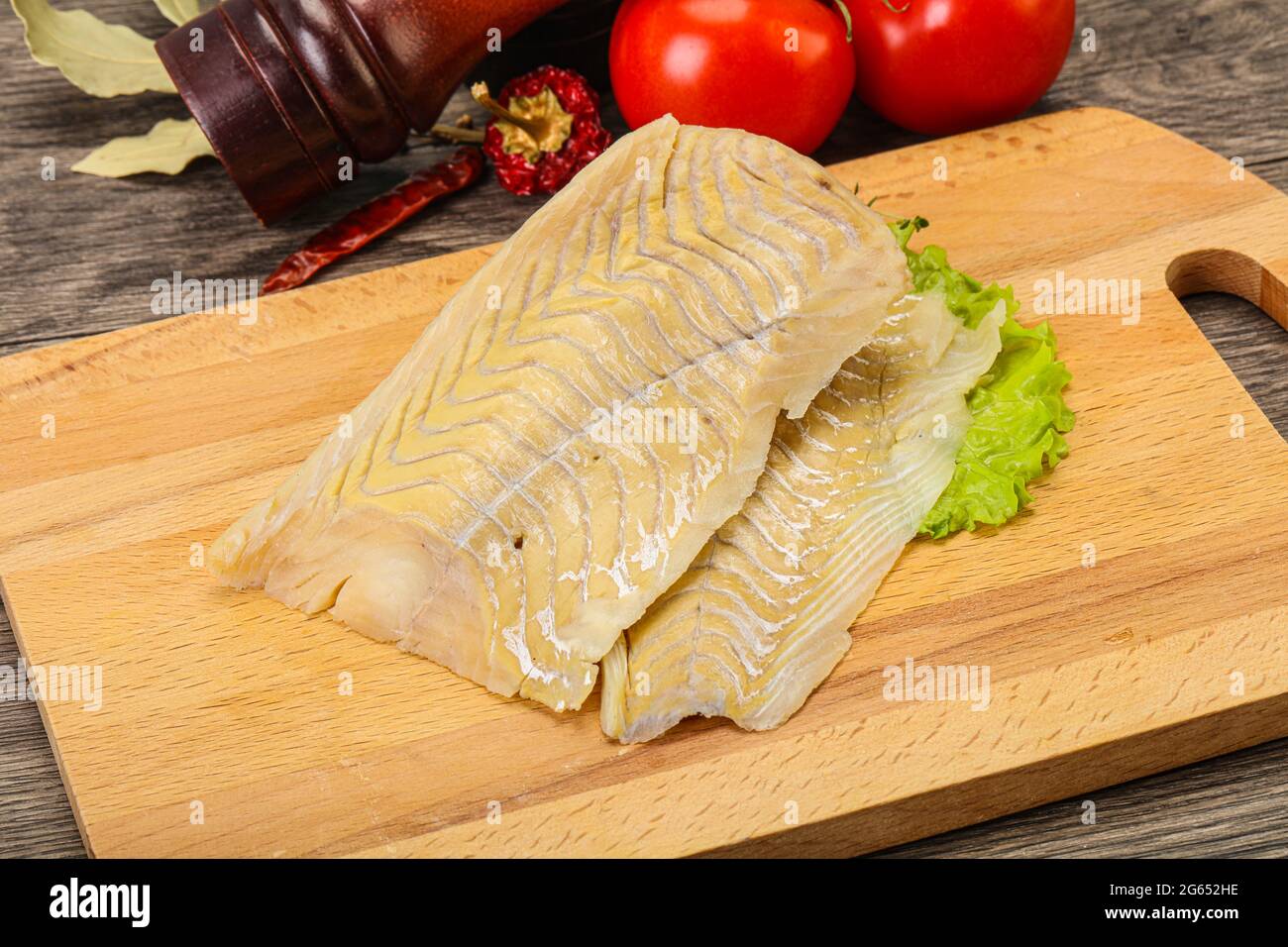 Raw cod fish fillet for cooking Stock Photo - Alamy