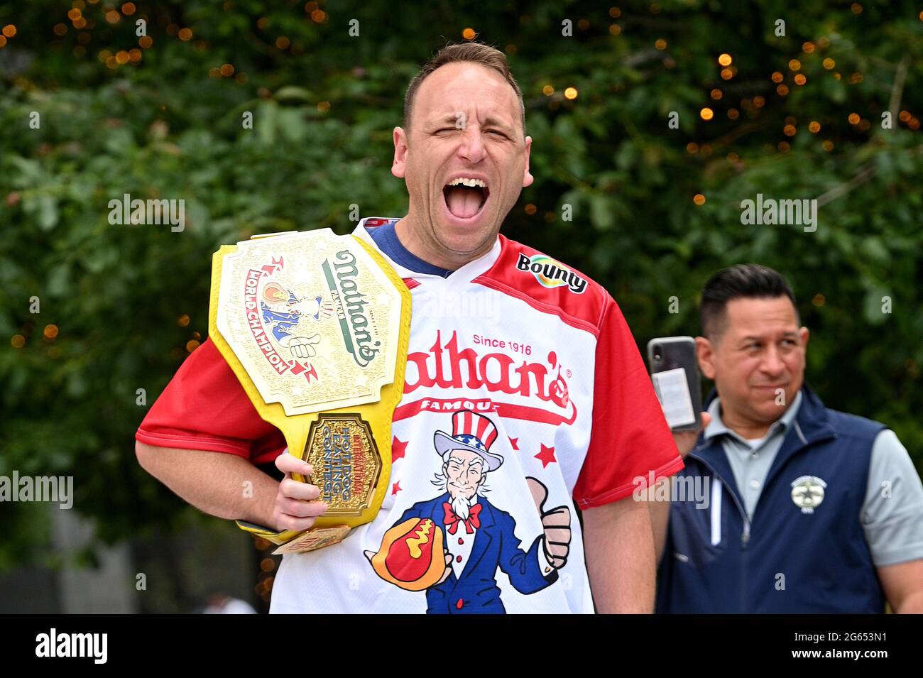 World record holder with 75 hot dogs eaten in 10 minutes, Joey Chestnut ...