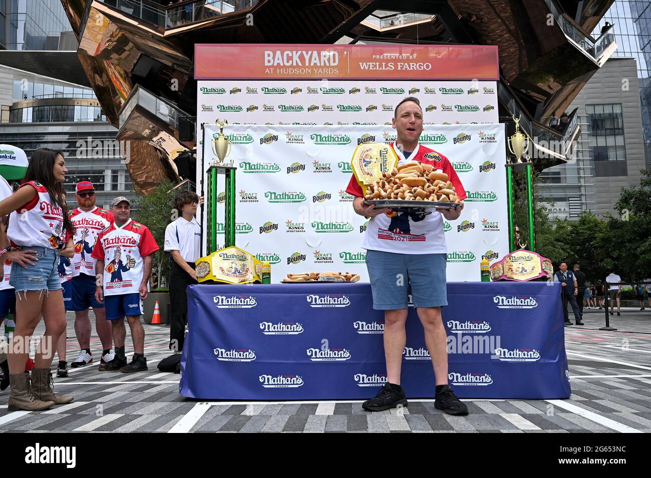 World record holder with 75 hot dogs (on tray) eaten in 10 minutes ...