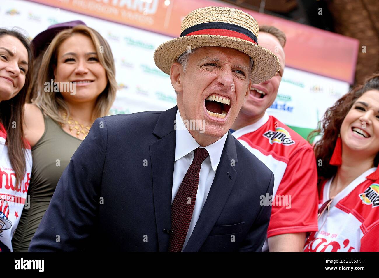 New York, USA. 02nd July, 2021. Host George Shea reacts as he poses for ...