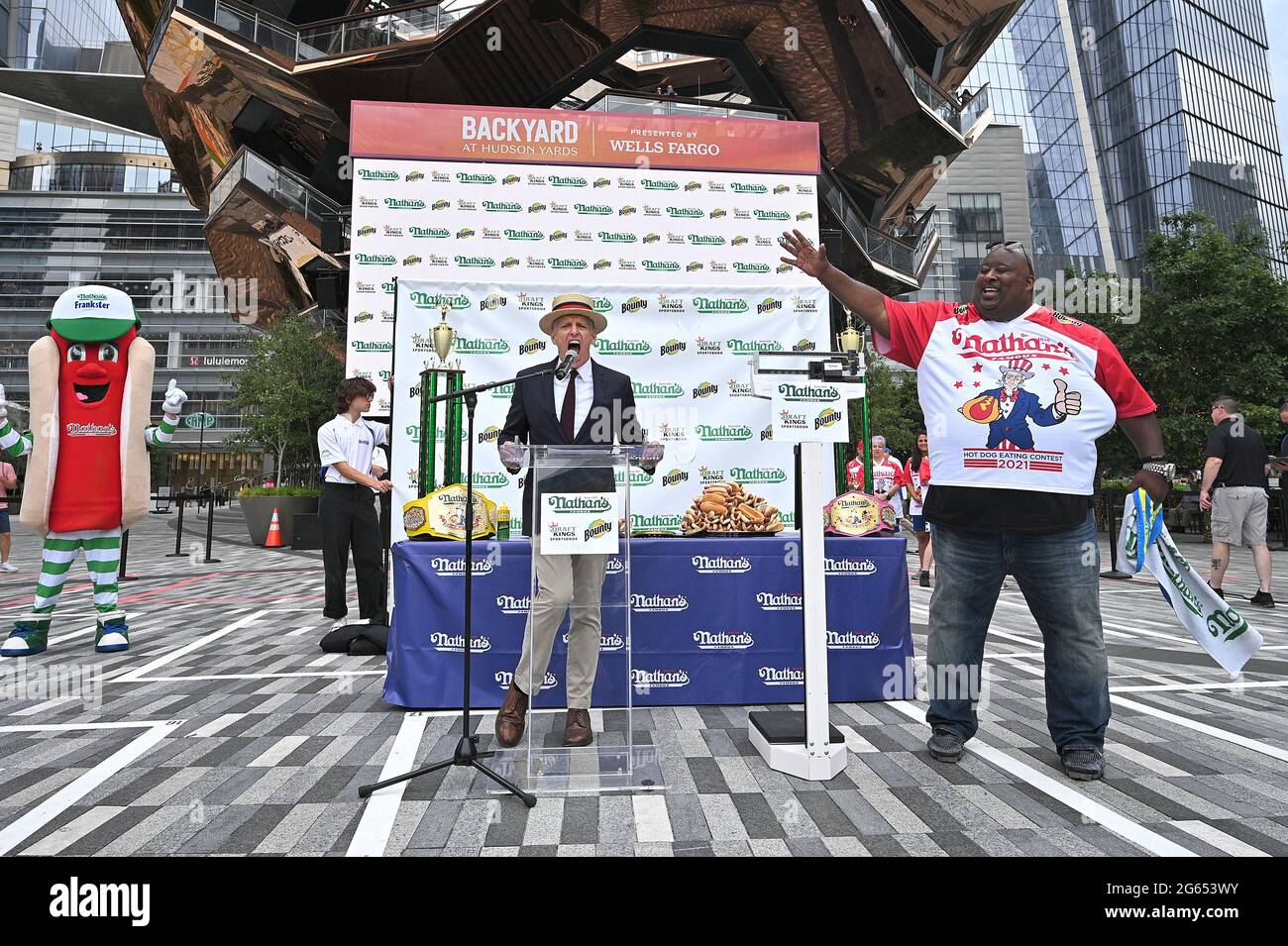 New York, USA. 02nd July, 2021. Host George Shea (at podium) and Eric ...