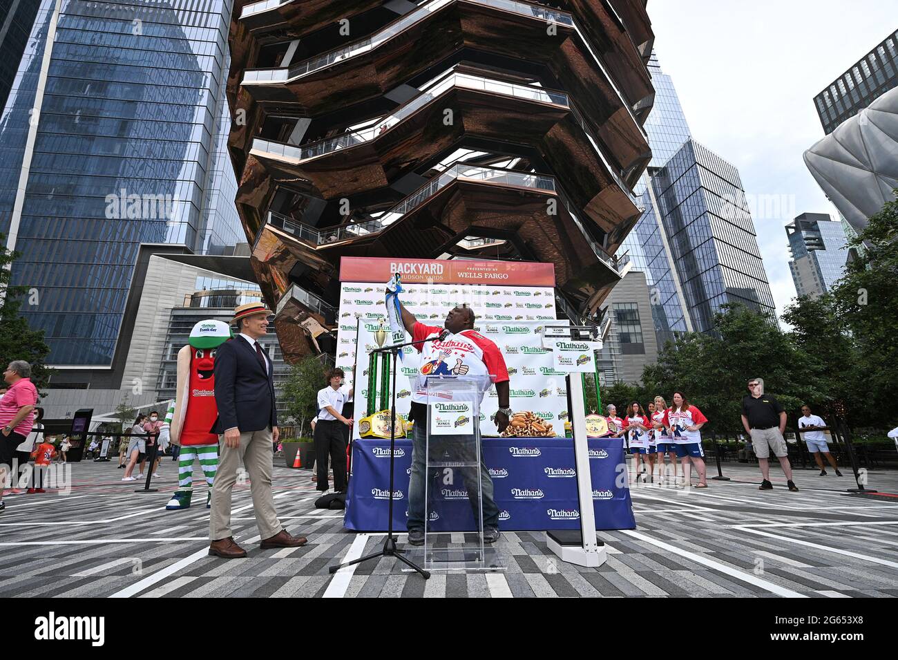 New York, USA. 02nd July, 2021. Host George Shea (at podium) and Eric ...