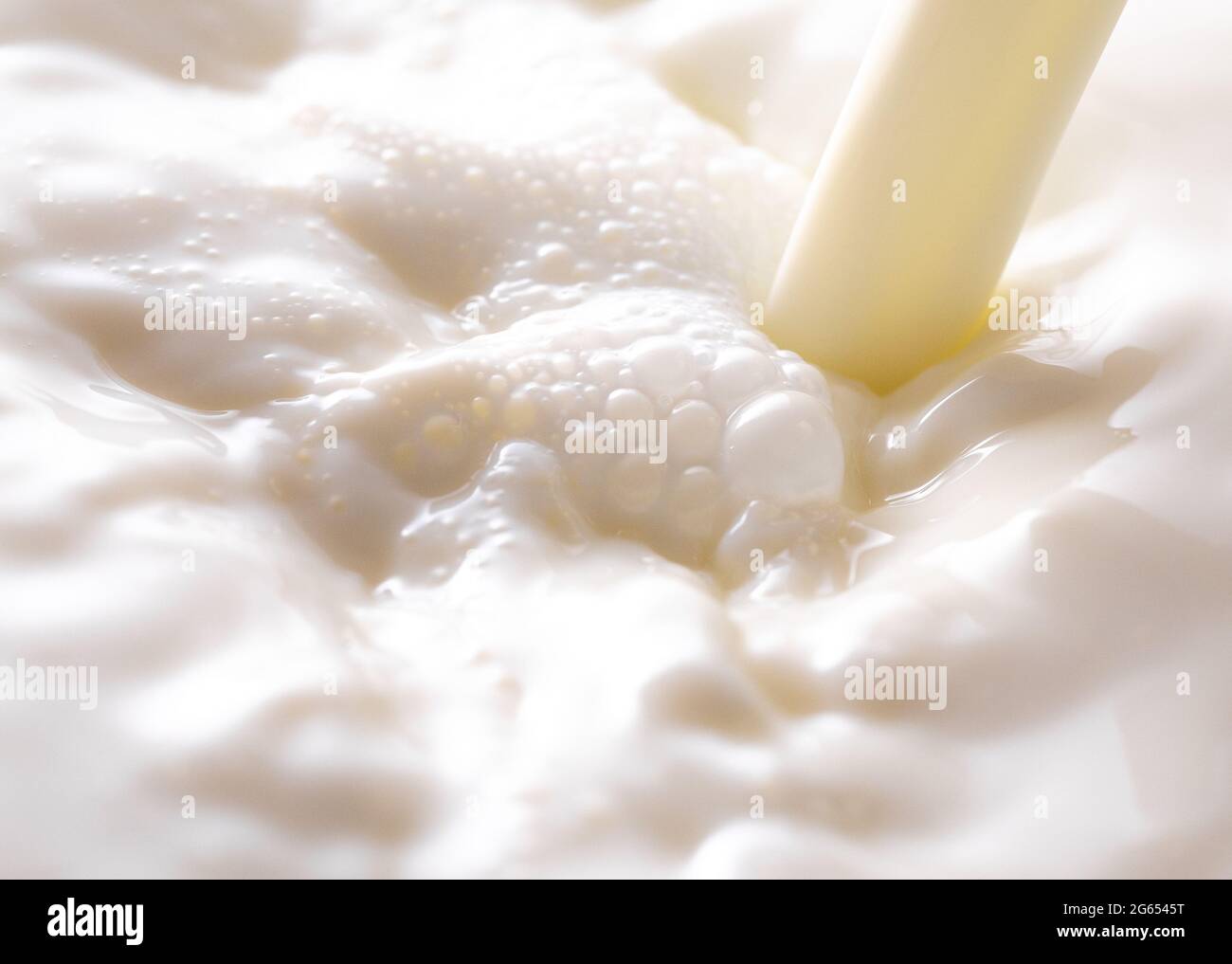 A Steam of Milk Being Poured in a Bowl Milk Stock Photo - Alamy
